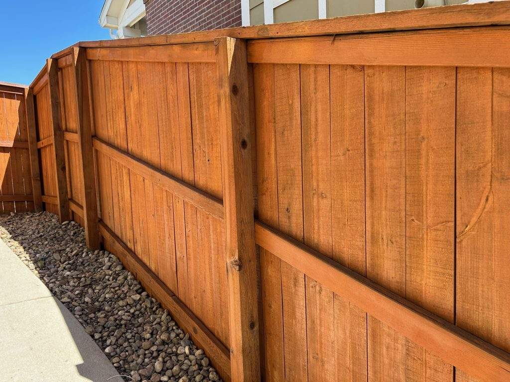 Fence Staining – Elevate Fencing, LLC